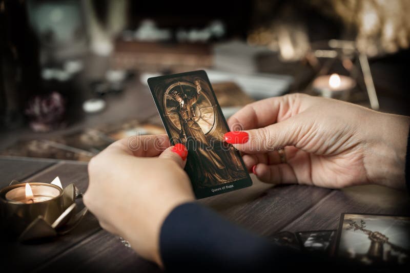 Tarot Card Reader Arranges Cards in a Card Spread. Fortune-telling ...