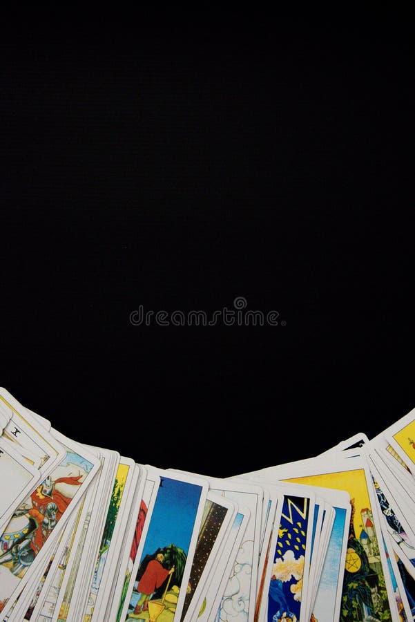 Tarot Cards Placed on the Bottom of the Image. Black Surface Stock ...