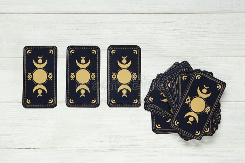 Tarot Cards on White Wooden Table, Flat Lay. Reverse Side Editorial ...