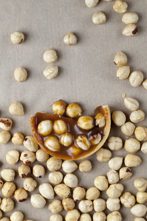 Tartlet with Salted Caramel and Hazelnuts Stock Photo - Image of ...