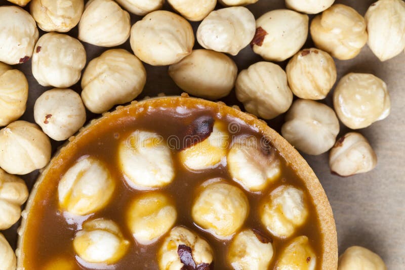Tartlet with Salted Caramel and Hazelnuts Stock Image - Image of ...