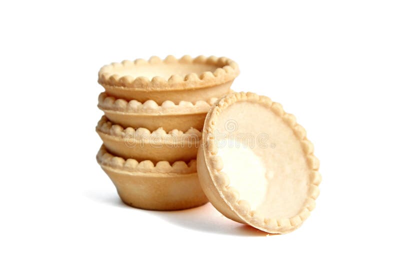Tartlet Shells Isolated on White Background. Stacked Empty Mini Tart ...