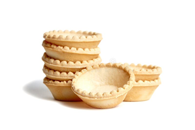 Tartlet Shells Isolated on White Background. Stacked Empty Mini Tart ...