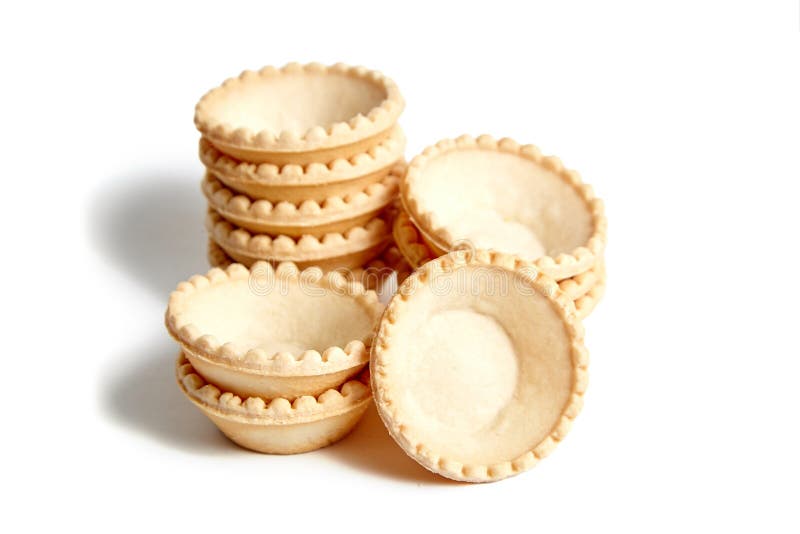 Tartlet Shells Isolated on White Background. Stacked Empty Mini Tart ...