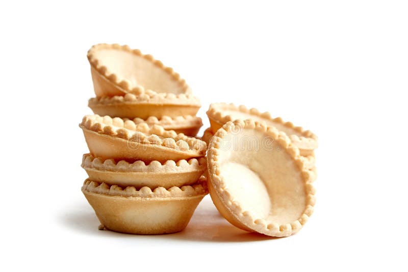 Tartlet Shells Isolated on White Background. Stacked Empty Mini Tart ...