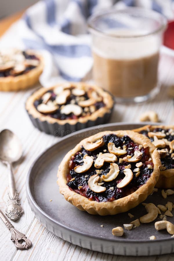 Tartlets with Apple Jam and Blueberry Confiture Stock Image - Image of ...