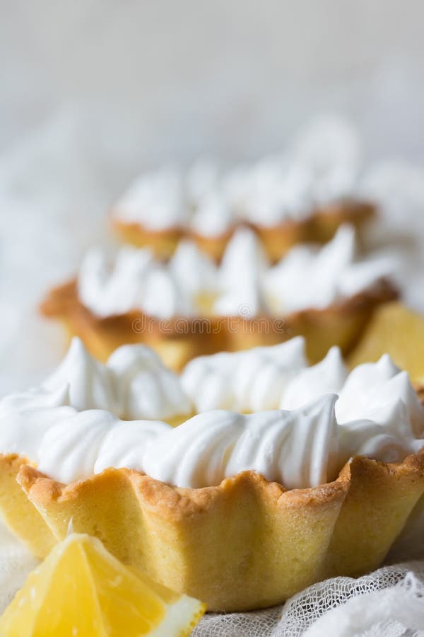 Tartlets with Custard Lemon Cream and Meringue Stock Photo - Image of ...