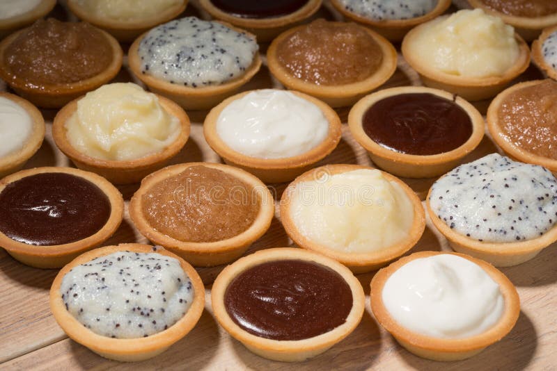 Tartlets on the Table, Assortment with Different Creams Stock Photo ...