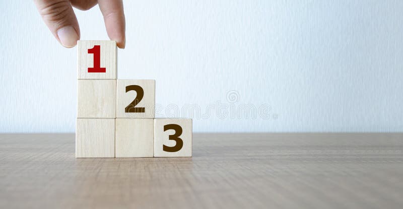 Task Priority and Management Concept, Hand Arranging Wooden Cube Blocks ...