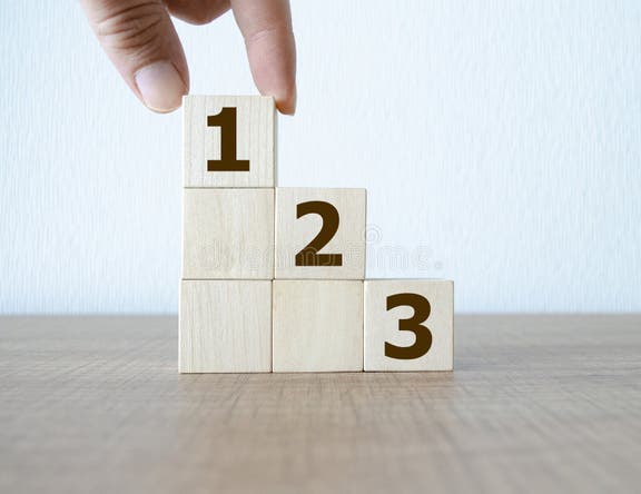 Task Priority and Management Concept, Hand Arranging Wooden Cube Blocks ...