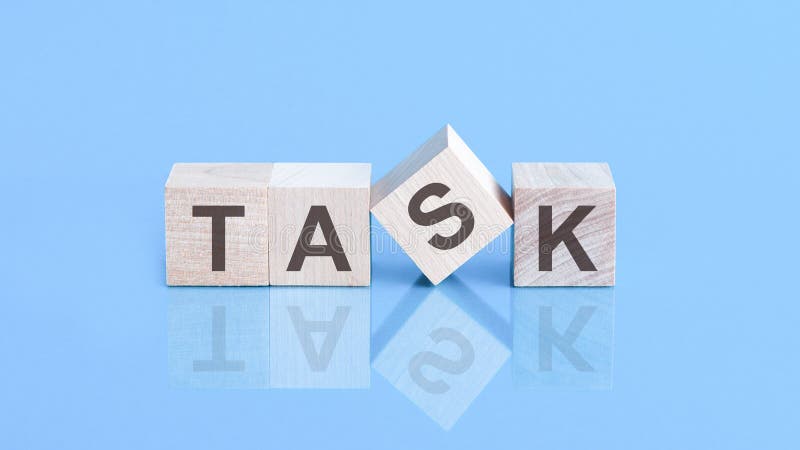 Task - Text on Wooden Cubes on Blue Background Stock Image - Image of ...
