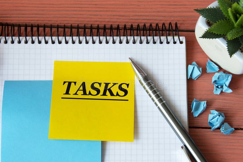 TASKS the Word on Wooden Cubes, Cubes Stand on a Reflective Surface ...