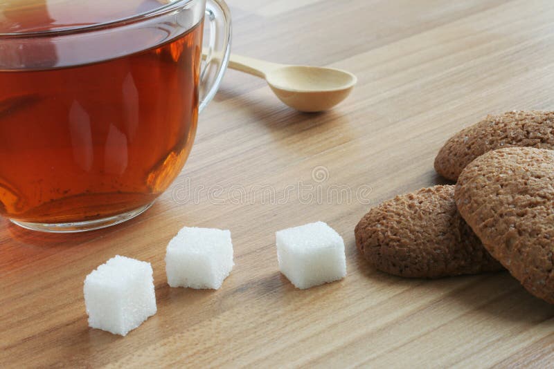 Tasse Tee und Zucker stockbild. Bild von bäckerei, tabelle - 12472341