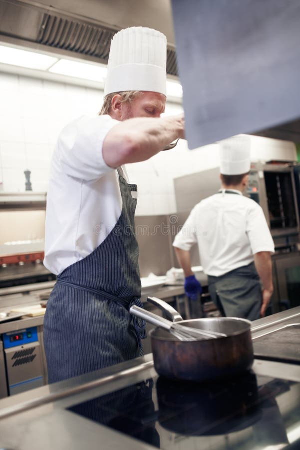 Always Taste Your Food. Chefs Preparing a Meal Service in a ...