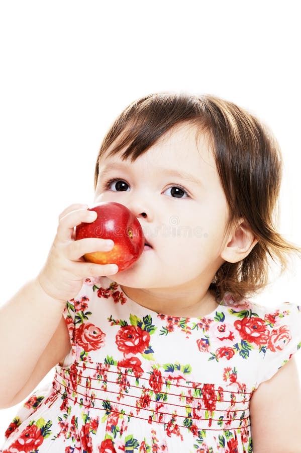 Tasting an apple stock photo. Image of asian, beautiful - 28935624