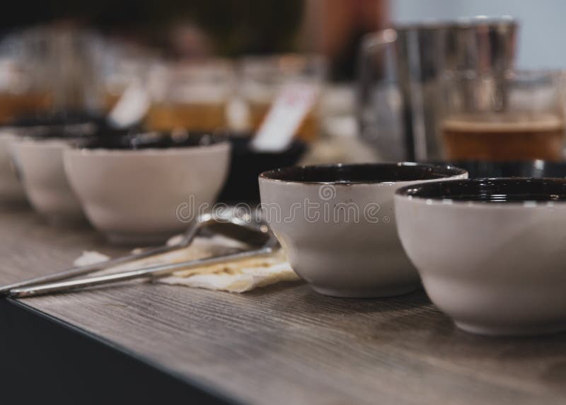 Tasting Coffee in Glass, Coffee Cups on Table for Tasting Stock Photo ...