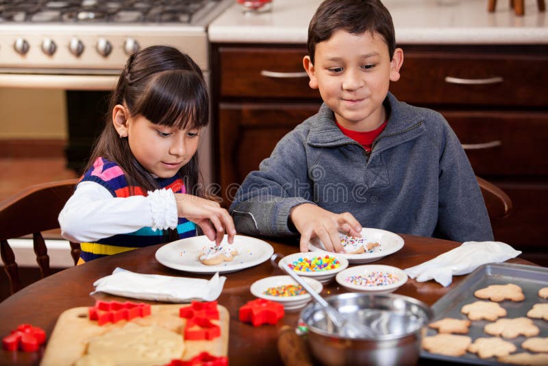 Tasting Some Holiday Cookies Stock Photo - Image of smile, cookies ...