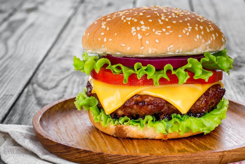 Tasty and Appetizing Hamburger Cheeseburger Stock Photo - Image of ...