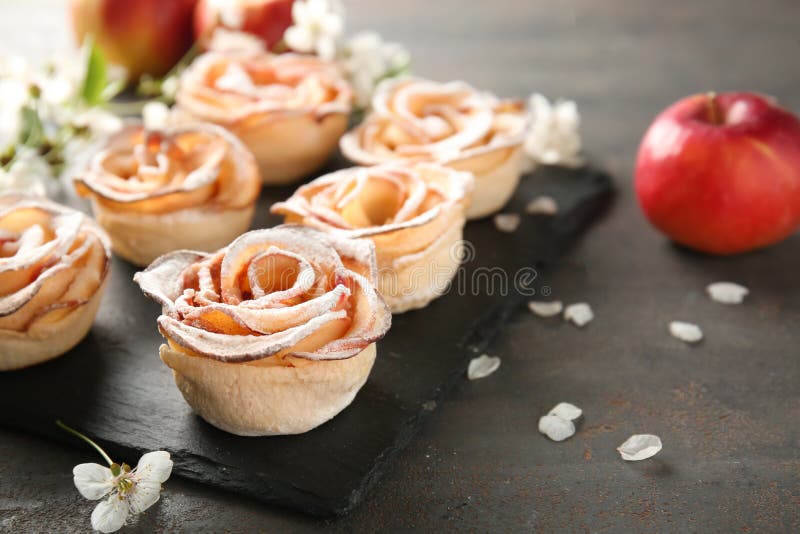 Tasty Apple Roses from Puff Pastry on Slate Plate Stock Photo - Image ...