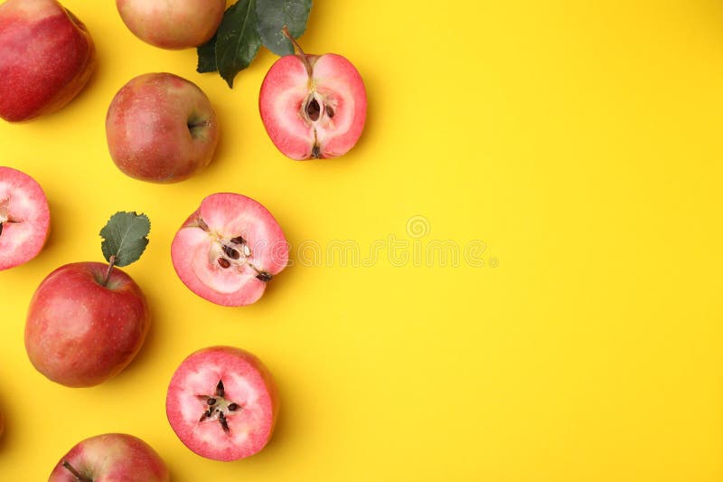 Tasty Apples with Red Pulp and Leaves on Yellow Background, Flat Lay ...