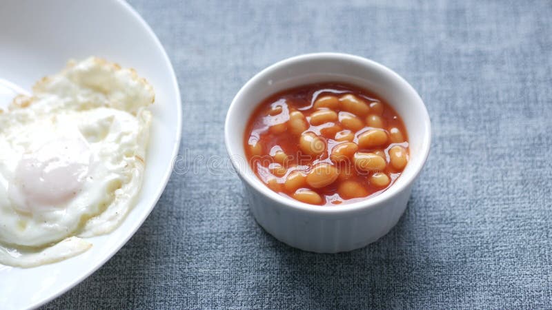 Tasty Baked Beans, Egg and Bread for Morning Break Fast Stock Video ...