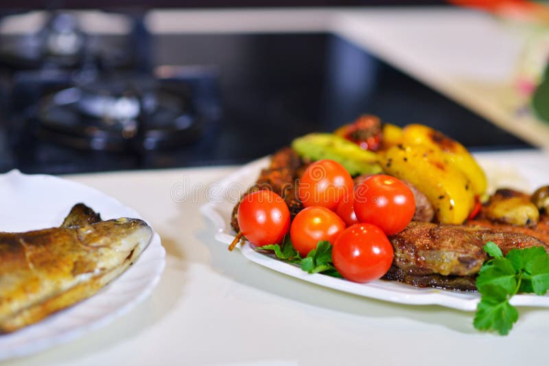 Tasty Baked Fish on Plate on Table Close-up Stock Photo - Image of ...