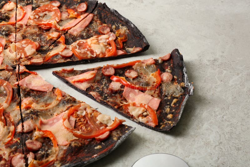 Black Pizza stock photo. Image of mollusk, herb, pizza - 13779760