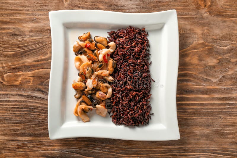 Tasty Boiled Wild Rice with Seafood on Plate Stock Photo - Image of ...