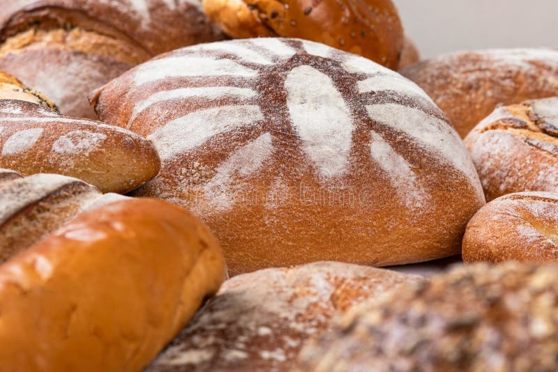 Tasty breads with flour stock image. Image of organic - 190040529
