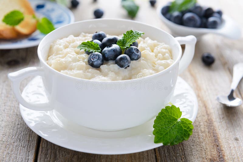 Tasty Breakfast: Rice Pudding with Blueberry Stock Image - Image of ...
