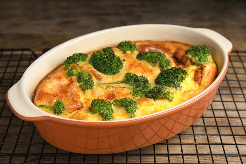 Tasty Broccoli Casserole in Baking Dish on Rack Stock Image - Image of ...