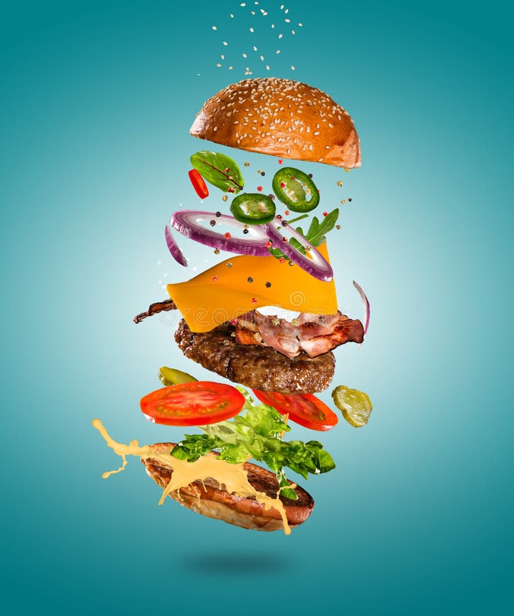 Tasty Cheeseburger with Flying Ingredients on Color Pastel Background ...