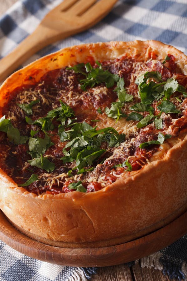Tasty Chicago style deep dish pizza closeup. Vertical - Stock Image ...