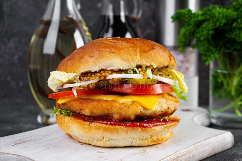 Tasty Chicken Burger With Lettuce Cheese Tomato And Pickle Fast Food Sandwich With Chicken