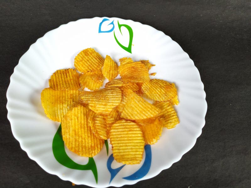 Tasty chips on a plate. stock photo. Image of salty - 180224108