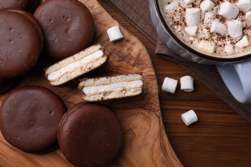Tasty Choco Pies and Cocoa with Marshmallows on Wooden Table, Flat Lay ...