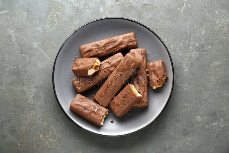 Tasty Chocolate Bars with Caramel on Grey Table, Top View Stock Image ...