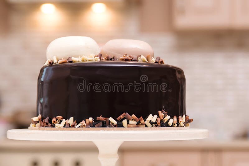 Tasty Chocolate Cake on Table at Kitchen. Chocolate Cake with Glaze ...