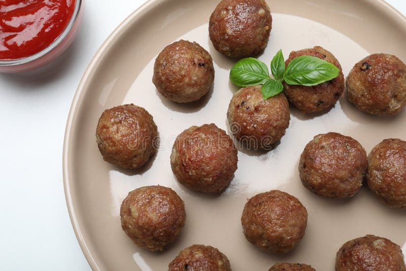 Tasty Cooked Meatballs with Basil on White Table, Flat Lay Stock Image ...