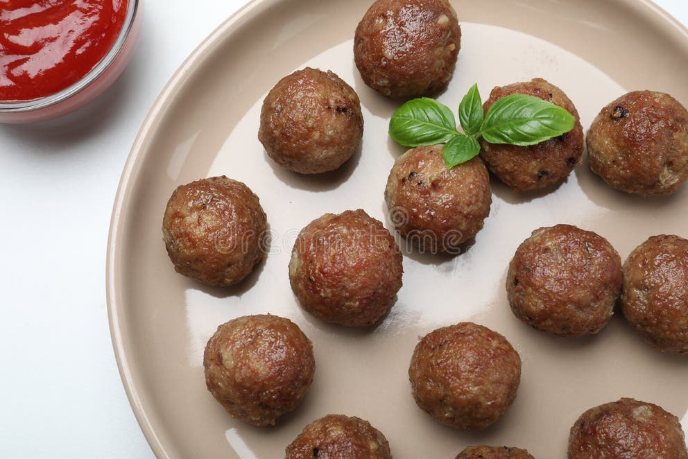 Tasty Cooked Meatballs with Basil on White Table, Flat Lay Stock Image ...
