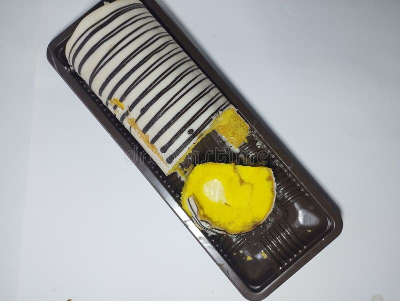 Tasty Creamy Roll Cake on Tray Stock Photo - Image of orange, tray ...