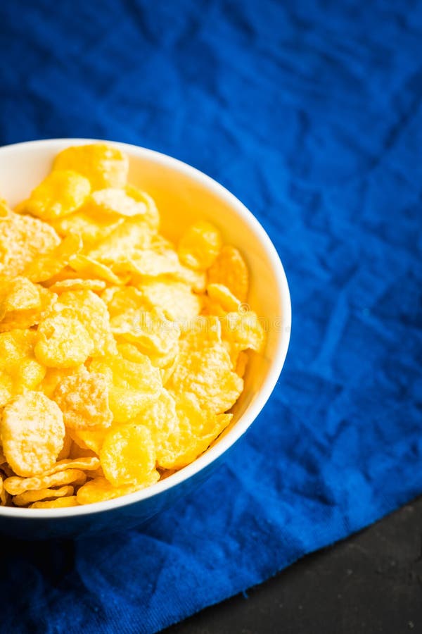 Tasty Crispy Corn Flakes in Bowl on the Rustic Background Stock Image ...