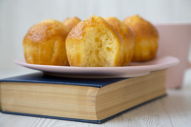 Tasty Cupcakes on a Book, Side View. Stock Image - Image of muffin ...