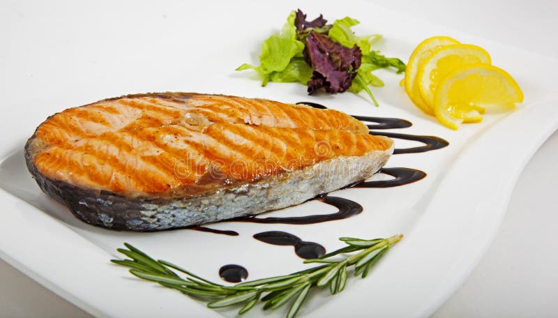 Tasty fish with vegetables stock photo. Image of yellow - 24599008