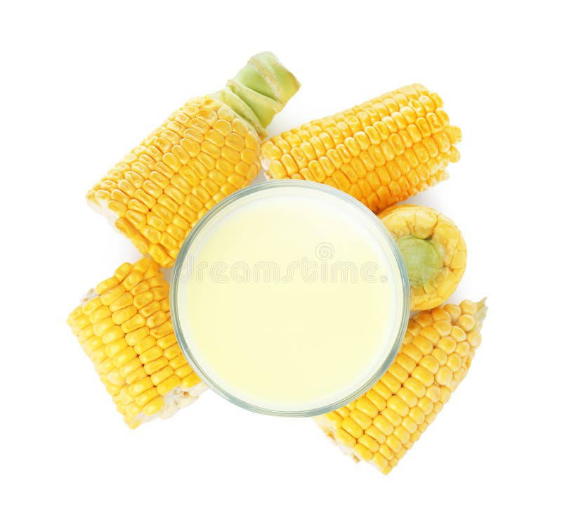Tasty Fresh Corn Milk in Glass and Cobs on White Background, Top View ...