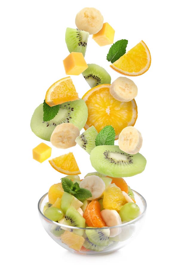 Tasty Fruit Salad. Fresh Ingredients Falling into Bowl on White ...