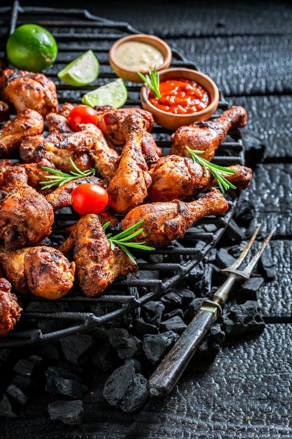 Tasty Grilled Chicken Leg with Sauces and Lime Stock Image - Image of ...