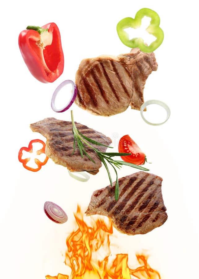 Tasty Grilled Meat, Different Vegetables and Fire Flame on White ...