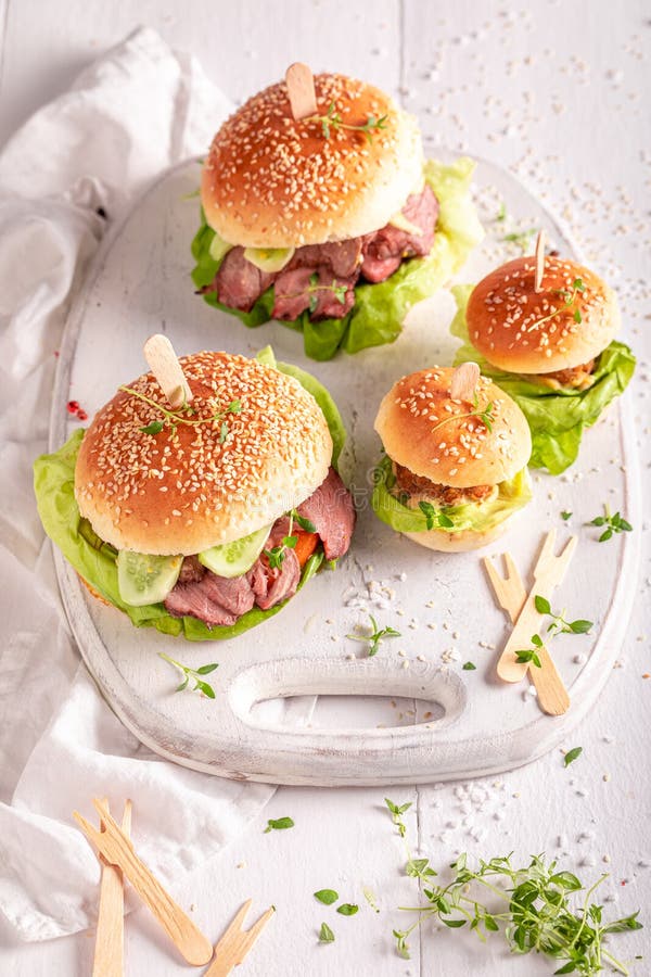 Tasty Hamburger with Beef, Vegetables and Sesame Stock Photo - Image of ...