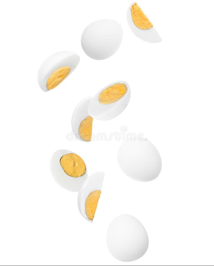 Tasty Hard Boiled Eggs Falling on White Background Stock Image - Image ...